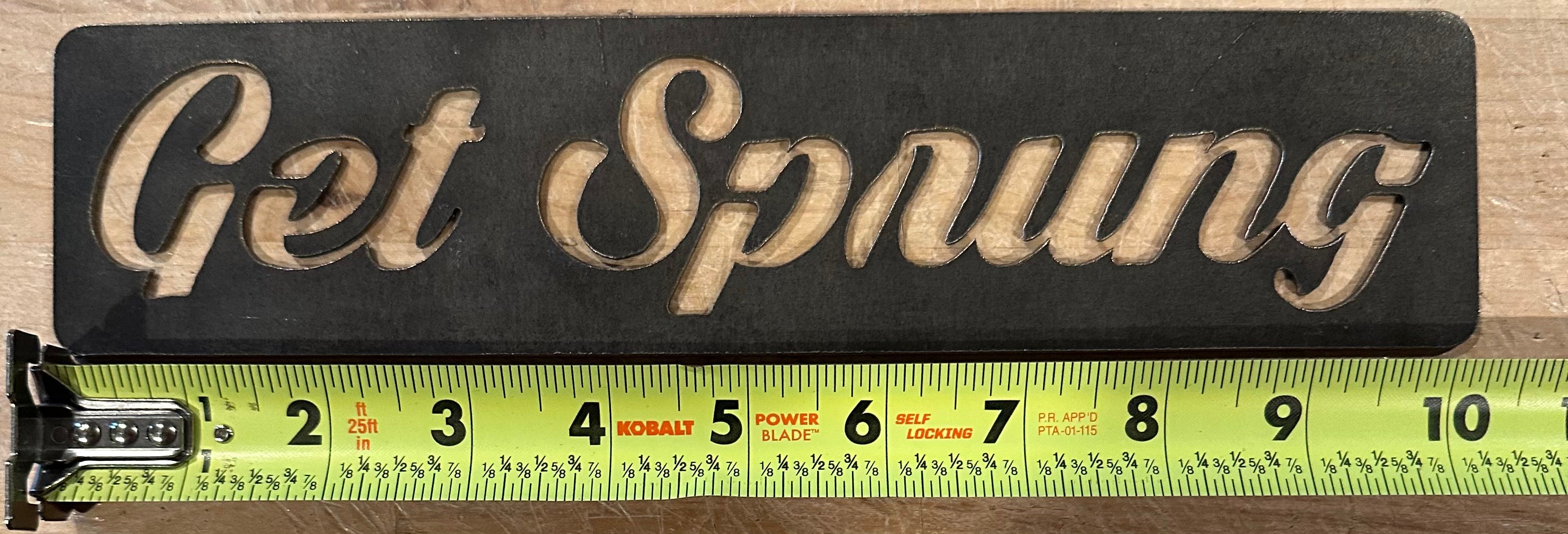 The GET SPRUNG STEEL sign cut out. The AR-TT | The Takedown Tools